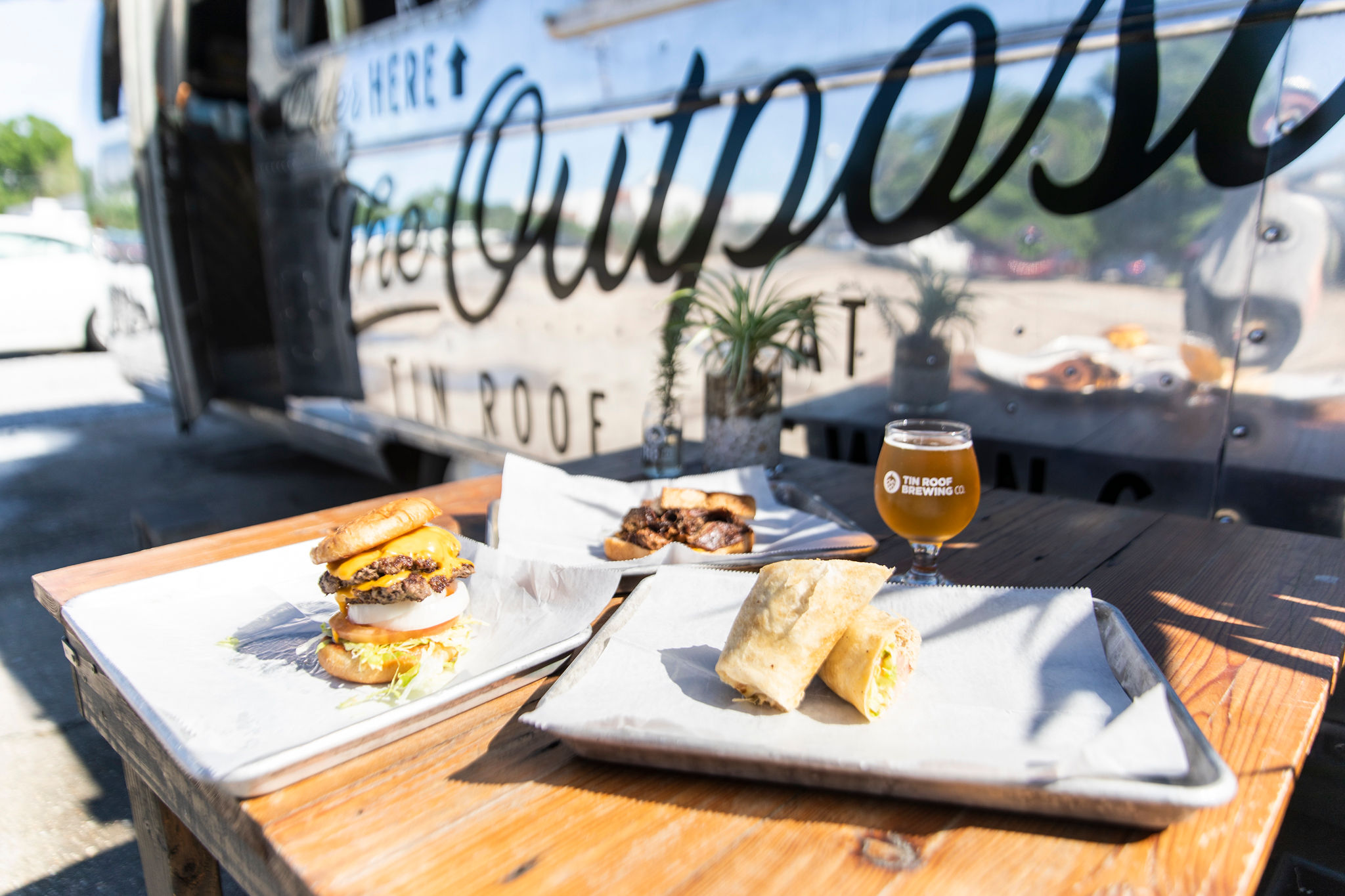 Tin Roof's food truck The Outpost is serving up burgers, brisket and more